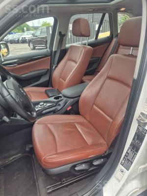 White BMW X1 2011 in Riga, with an engine capacity of 2.00 L and mileage of 293 thousand km for 6990 €, photo 14 on AUTOMOTO.COM.LV