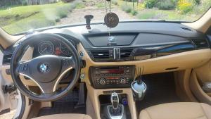White BMW X1 2012 in Utena, with an engine capacity of 2.00 L and mileage of 227 thousand km for 8300 €, photo 14 on AUTOMOTO.COM.LV