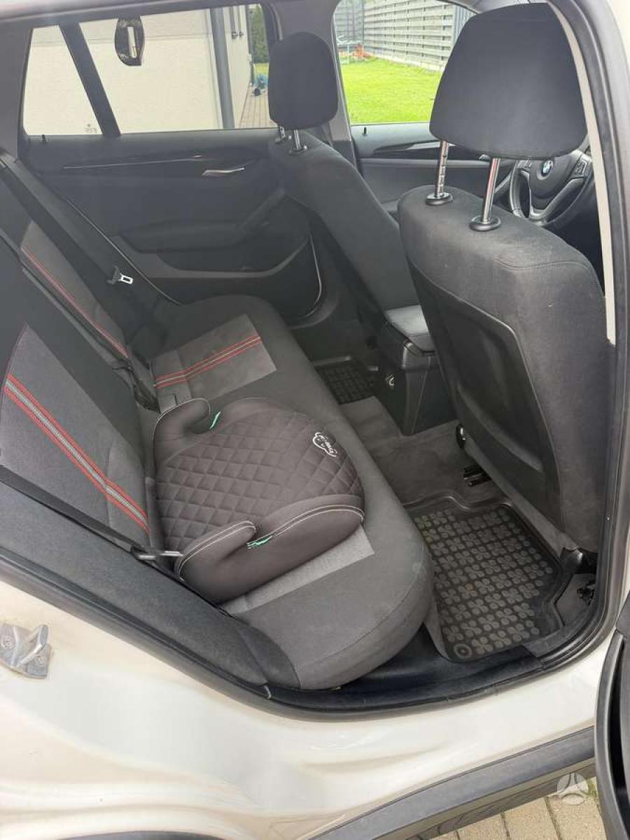 White BMW X1 2012 in Kaunas, with an engine capacity of 2.00 L and mileage of 324 thousand km for 5750 €, photo 13 on AUTOMOTO.COM.LV