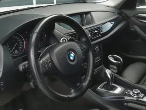 White BMW X1 2013 in Riga, with an engine capacity of 2.00 L and mileage of 243 thousand km for 10590 €, photo 9 on AUTOMOTO.COM.LV