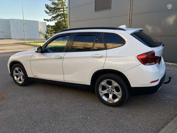White BMW X1 2013 in Marijampole, with an engine capacity of 2.00 L and mileage of 298 thousand km for 6699 €, photo 6 on AUTOMOTO.COM.LV
