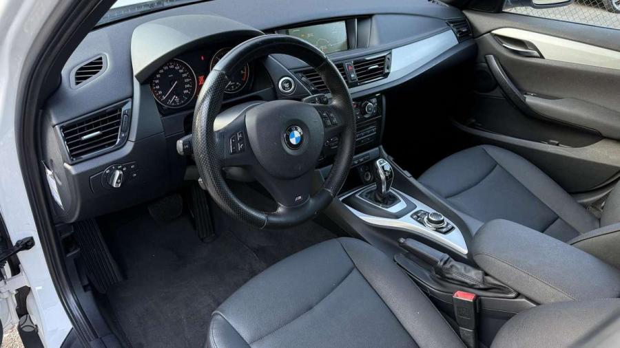 White BMW X1 2013 in Ukmerge, with an engine capacity of 2.00 L and mileage of 291 thousand km for 7300 €, photo 15 on AUTOMOTO.COM.LV