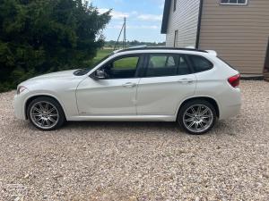 White BMW X1 2013 in Vilnius, with an engine capacity of 3.00 L and mileage of 130 thousand km for 8300 €, photo 9 on AUTOMOTO.COM.LV
