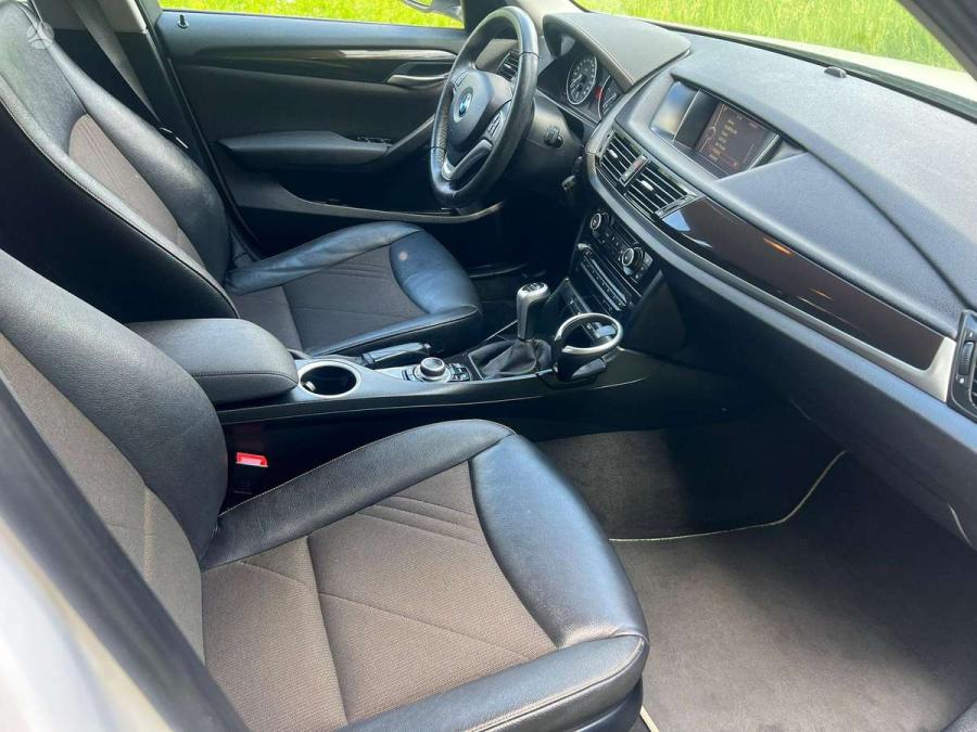 White BMW X1 2014 in Utena, with an engine capacity of 2.00 L and mileage of 233 thousand km for 7200 €, photo 11 on AUTOMOTO.COM.LV