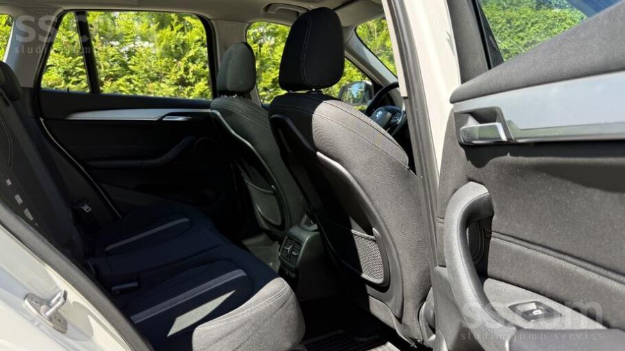 White BMW X1 2016 in Riga, with an engine capacity of 2.00 L and mileage of 206 thousand km for 14800 €, photo 20 on AUTOMOTO.COM.LV