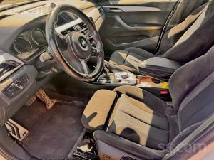 White BMW X1 2018 in Riga, with an engine capacity of 2.00 L and mileage of 126 thousand km for 16990 €, photo 8 on AUTOMOTO.COM.LV