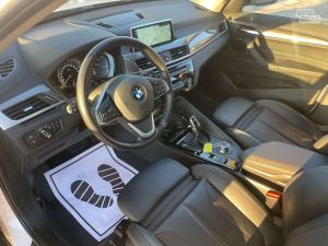 White BMW X1 2019 in Kaunas, with an engine capacity of 2.00 L and mileage of 100 thousand km for 22287 €, photo 14 on AUTOMOTO.COM.LV
