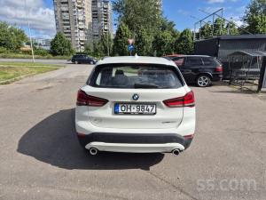 White BMW X1 2021 in Riga, with an engine capacity of 2.00 L and mileage of 254 thousand km for 17490 €, photo 8 on AUTOMOTO.COM.LV
