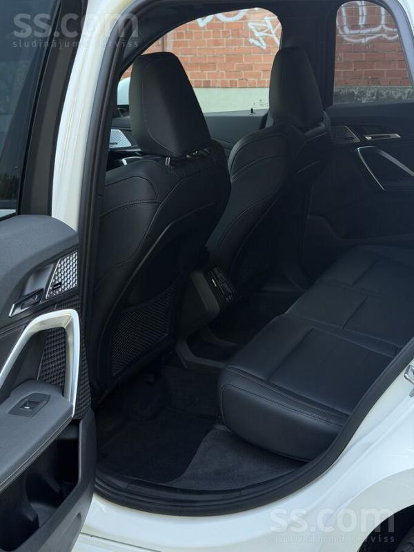 White BMW X1 2022 in Riga, with an engine capacity of 2.00 L and mileage of 57 thousand km for 34980 €, photo 10 on AUTOMOTO.COM.LV