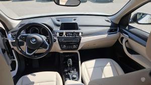 White BMW X1 2019 in Kaunas, with an engine capacity of 1.50 L and mileage of 131 thousand km for 14500 €, photo 5 on AUTOMOTO.COM.LV