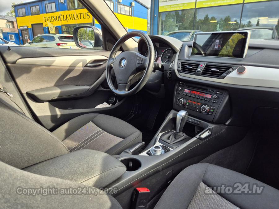 Желтый БМВ Х1 2010 в Тарту, объемом двигателя 2.00 л и пробегом 200 тыс. км за 7990 €, фото 4 на AUTOMOTO.COM.LV