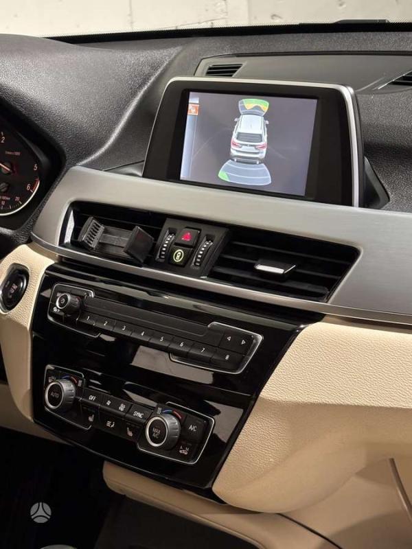 Yellow BMW X1 2017 in Klaipeda, with an engine capacity of 2.00 L and mileage of 154 thousand km for 13900 €, photo 7 on AUTOMOTO.COM.LV