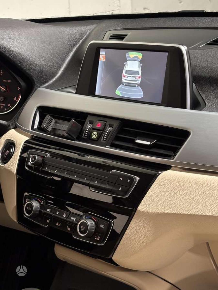 Yellow BMW X1 2017 in Klaipeda, with an engine capacity of 2.00 L and mileage of 154 thousand km for 13900 €, photo 7 on AUTOMOTO.COM.LV