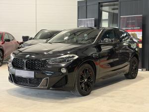 Black BMW X2 2019 in Riga, with an engine capacity of 2.00 L and mileage of 132 thousand km for 17690 €, photo 6 on AUTOMOTO.COM.LV