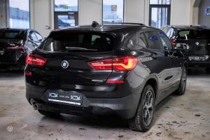 Black BMW X2 2020 in Kaunas, with an engine capacity of 1.50 L and mileage of 110 thousand km for 19950 €, photo 12 on AUTOMOTO.COM.LV