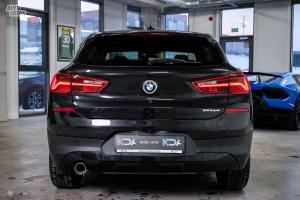 Black BMW X2 2020 in Marijampole, with an engine capacity of 1.50 L and mileage of 110 thousand km for 19450 €, photo 12 on AUTOMOTO.COM.LV