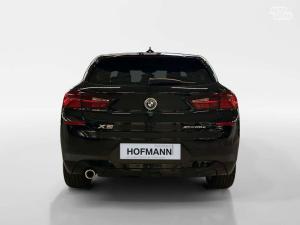 Black BMW X2 2022 in Kaunas, with an engine capacity of 1.50 L and mileage of 30 thousand km for 32056 €, photo 8 on AUTOMOTO.COM.LV