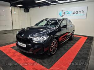 Black BMW X2 2022 in Tallinn, with an engine capacity of 2.00 L and mileage of 79 thousand km for 32990 €, photo 2 on AUTOMOTO.COM.LV