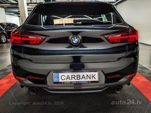 Black BMW X2 2022 in Tallinn, with an engine capacity of 2.00 L and mileage of 79 thousand km for 32990 €, photo 4 on AUTOMOTO.COM.LV
