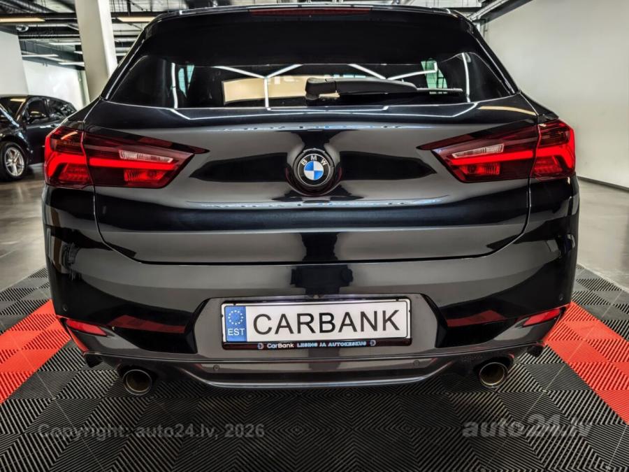 Black BMW X2 2022 in Tallinn, with an engine capacity of 2.00 L and mileage of 79 thousand km for 32990 €, photo 4 on AUTOMOTO.COM.LV