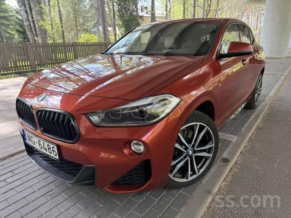 Orange BMW X2 2019 in Riga, with an engine capacity of 2.00 L and mileage of 98 thousand km for 20950 €, photo 4 on AUTOMOTO.COM.LV