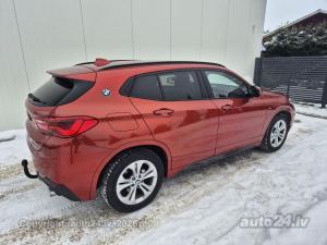Orange BMW X2 2018 in Tallinn, with an engine capacity of 2.00 L and mileage of 129 thousand km for 23700 €, photo 6 on AUTOMOTO.COM.LV