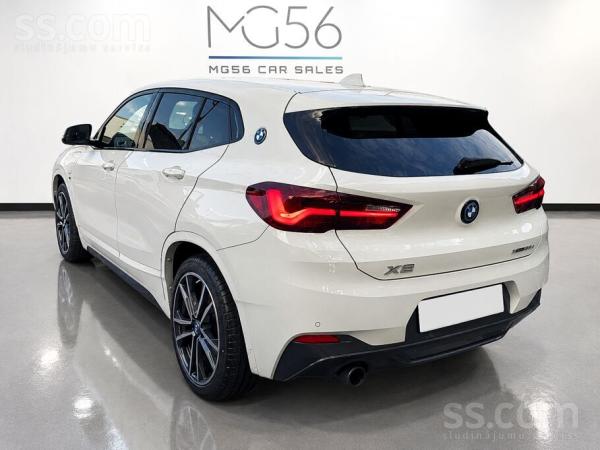BMW X2 2023 in Riga on AUTOMOTO.COM.LV White BMW X2 2023 in Riga, with an engine capacity of 1.50 L and mileage of 112 thousand km for 25900 €, photo 3 on AUTOMOTO.COM.LV