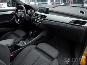 Yellow BMW X2 2018 in Riga, with an engine capacity of 2.00 L and mileage of 77 thousand km for 21490 €, photo 10 on AUTOMOTO.COM.LV