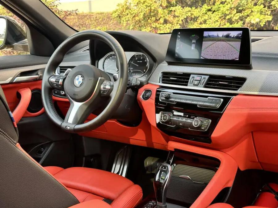 Yellow BMW X2 2020 in Riga, with an engine capacity of 2.00 L and mileage of 160 thousand km for 26900 €, photo 11 on AUTOMOTO.COM.LV