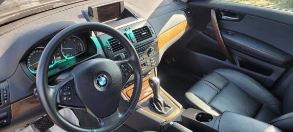 Black BMW X3 2009 in Riga, with an engine capacity of 2.00 L and mileage of 249 thousand km for 8000 €, photo 4 on AUTOMOTO.COM.LV