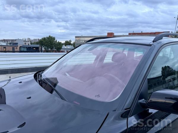 Black BMW X3 2009 in Riga, with an engine capacity of 2.00 L and mileage of 193 thousand km for 5500 €, photo 10 on AUTOMOTO.COM.LV