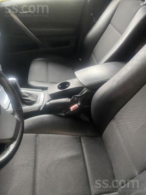 Black BMW X3 2010 in Riga, with an engine capacity of 2.00 L and mileage of 213 thousand km for 7650 €, photo 10 on AUTOMOTO.COM.LV