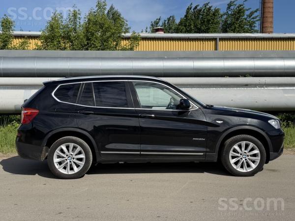 Black BMW X3 2011 in Riga, with an engine capacity of 2.00 L and mileage of 294 thousand km for 9800 €, photo 5 on AUTOMOTO.COM.LV