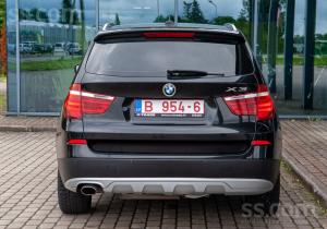 Black BMW X3 2011 in Cesis, with an engine capacity of 2.00 L and mileage of 203 thousand km for 10650 €, photo 6 on AUTOMOTO.COM.LV