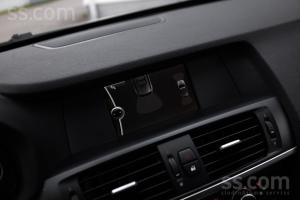 Black BMW X3 2011 in Jelgava, with an engine capacity of 2.00 L and mileage of 233 thousand km for 8500 €, photo 14 on AUTOMOTO.COM.LV