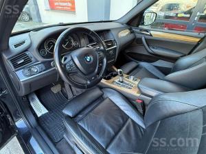 Black BMW X3 2013 in Riga, with an engine capacity of 2.00 L and mileage of 283 thousand km for 10500 €, photo 18 on AUTOMOTO.COM.LV