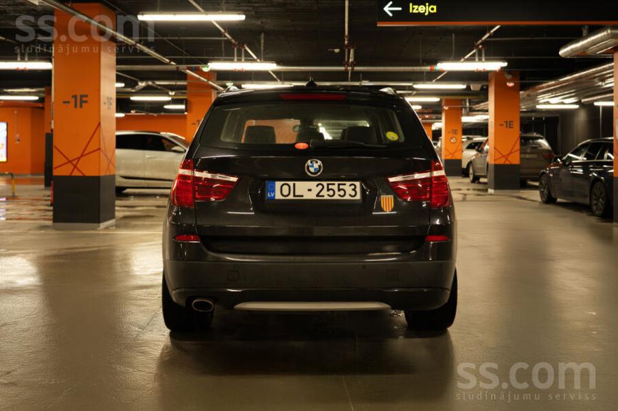Black BMW X3 2013 in Riga, with an engine capacity of 2.00 L and mileage of 185 thousand km for 13500 €, photo 6 on AUTOMOTO.COM.LV