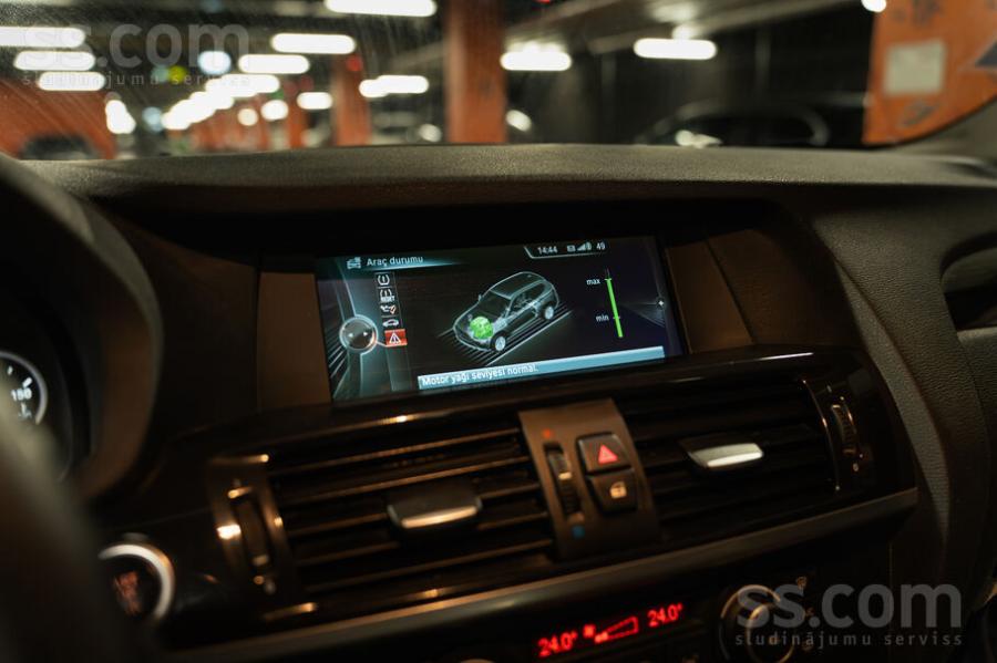 Black BMW X3 2013 in Riga, with an engine capacity of 2.00 L and mileage of 185 thousand km for 13500 €, photo 11 on AUTOMOTO.COM.LV