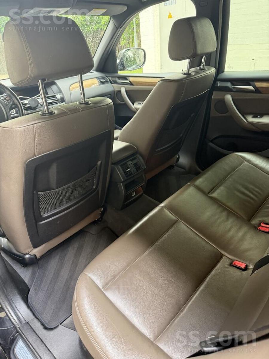 Black BMW X3 2013 in Riga, with an engine capacity of 3.00 L and mileage of 290 thousand km for 11900 €, photo 4 on AUTOMOTO.COM.LV