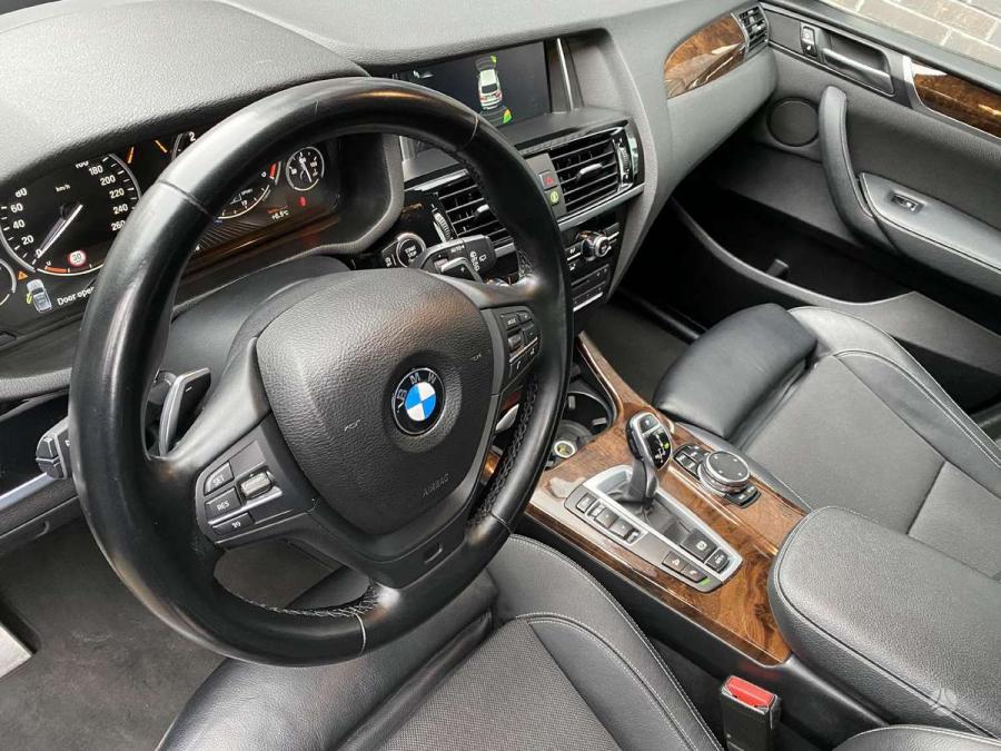 Black BMW X3 2014 in Marijampole, with an engine capacity of 2.99 L and mileage of 215 thousand km for 15999 €, photo 19 on AUTOMOTO.COM.LV