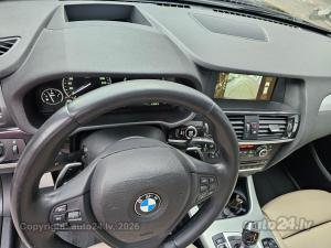 Black BMW X3 2014 in Tartu, with an engine capacity of 3.00 L and mileage of 310 thousand km for 11900 €, photo 15 on AUTOMOTO.COM.LV