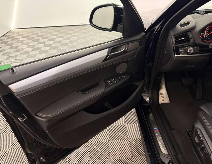 Black BMW X3 2015 in Marijampole, with an engine capacity of 2.99 L and mileage of 258 thousand km for 15200 €, photo 16 on AUTOMOTO.COM.LV