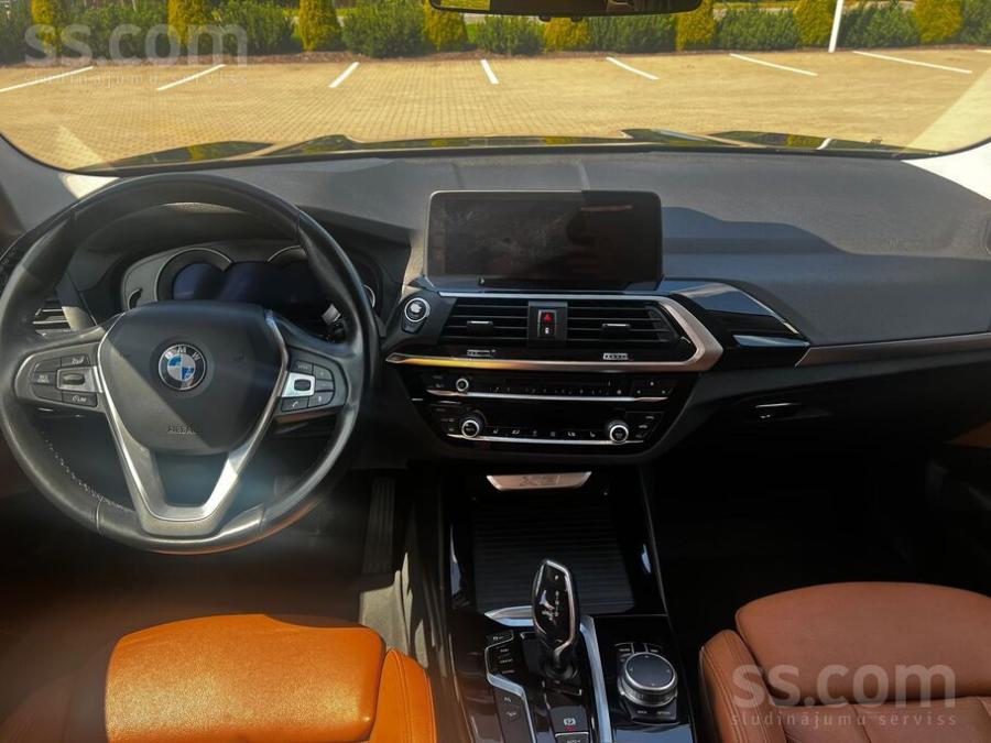 Black BMW X3 2018 in Riga, with an engine capacity of 2.00 L and mileage of 207 thousand km for 23500 €, photo 6 on AUTOMOTO.COM.LV