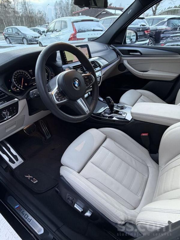 Black BMW X3 2019 in Riga, with an engine capacity of 3.00 L and mileage of 165 thousand km for 32990 €, photo 7 on AUTOMOTO.COM.LV