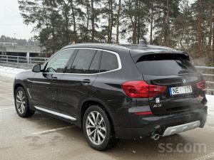 Black BMW X3 2019 in Riga, with an engine capacity of 2.00 L and mileage of 116 thousand km for 21500 €, photo 5 on AUTOMOTO.COM.LV