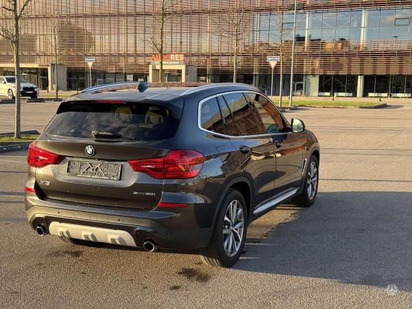 Black BMW X3 2019 in Klaipeda, with an engine capacity of 2.00 L and mileage of 128 thousand km for 22500 €, photo 6 on AUTOMOTO.COM.LV