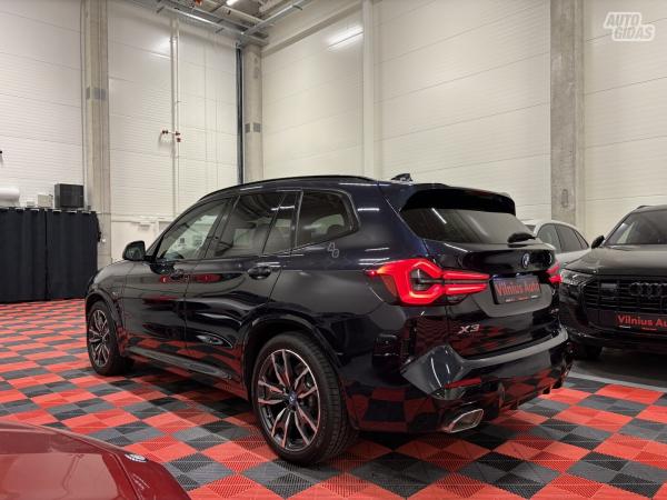 Black BMW X3 2021 in Vilnius, with an engine capacity of 2.00 L and mileage of 132 thousand km for 42990 €, photo 6 on AUTOMOTO.COM.LV
