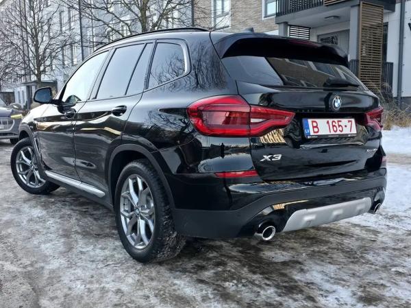 Black BMW X3 2021 in Riga, with an engine capacity of 2.00 L and mileage of 206 thousand km for 22990 €, photo 5 on AUTOMOTO.COM.LV
