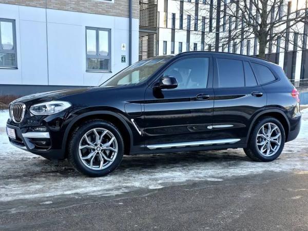Black BMW X3 2021 in Riga, with an engine capacity of 2.00 L and mileage of 206 thousand km for 22990 €, photo 8 on AUTOMOTO.COM.LV