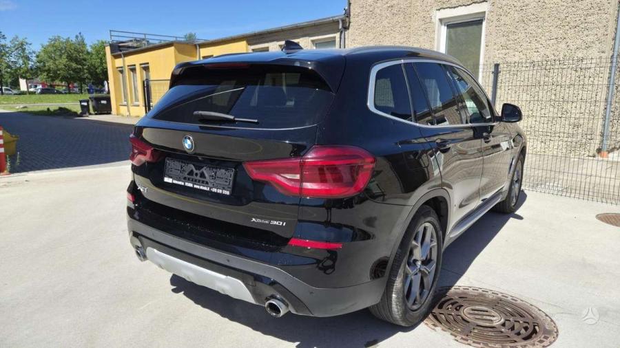 Black BMW X3 2021 in Klaipeda, with an engine capacity of 2.00 L and mileage of 207 thousand km for 19995 €, photo 8 on AUTOMOTO.COM.LV